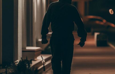 shady-man-walking - UponArriving